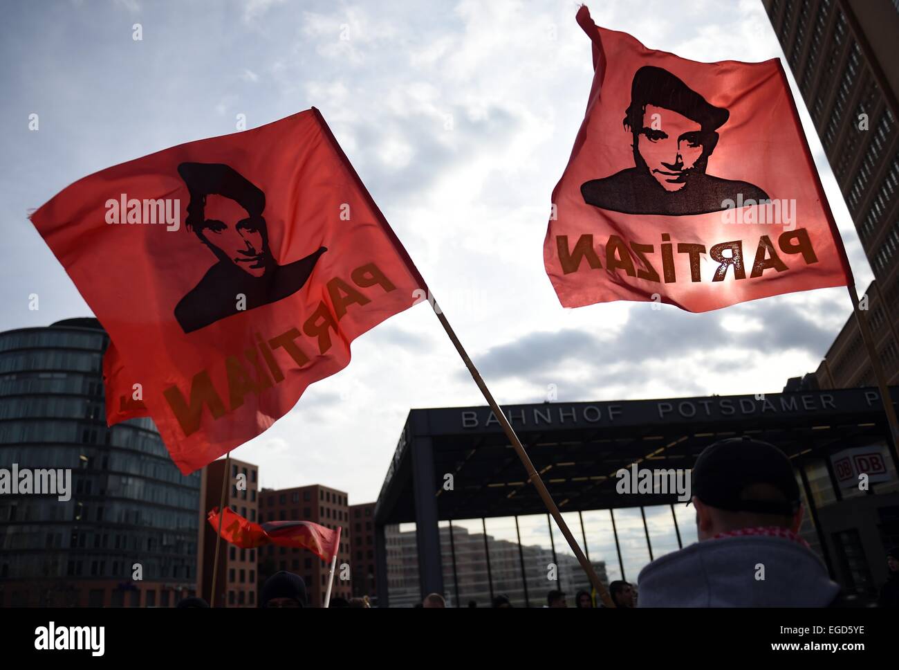 Demonstrators hold PKK flags (Kurdistan Workers' Party) in their hands ...