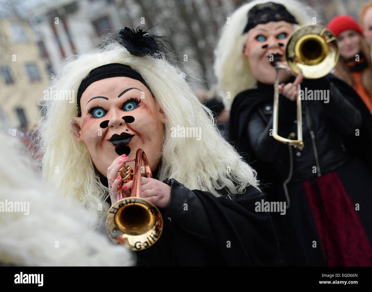Dressed up traditional farmers' Carnival fools take part in a ...