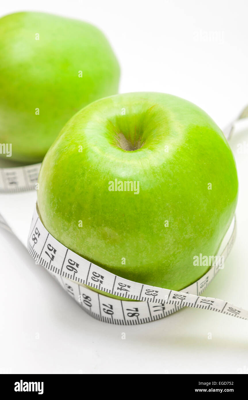 Green apple with measurement Stock Photo - Alamy
