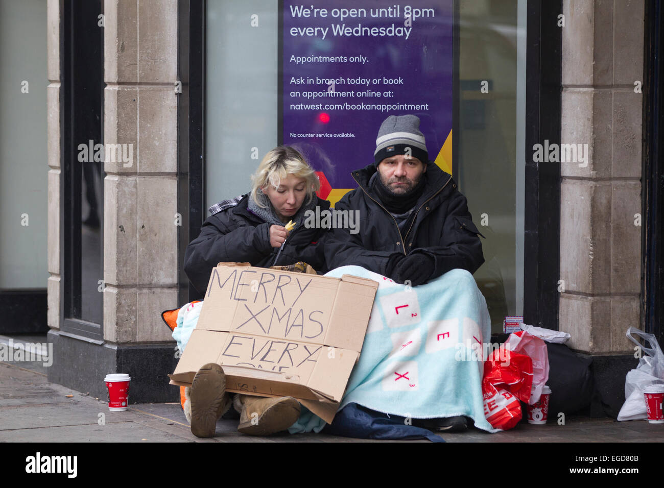 Homeless couple begging on the streets of London, Charing Cross ...