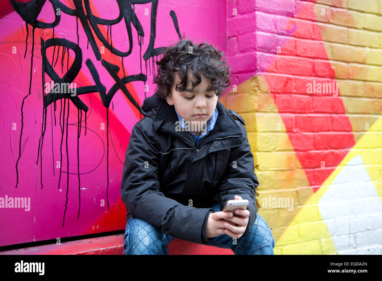 Sitting on step hi-res stock photography and images - Alamy