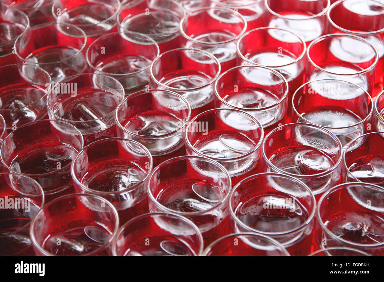 Red beverage in glass for drinks background Stock Photo - Alamy