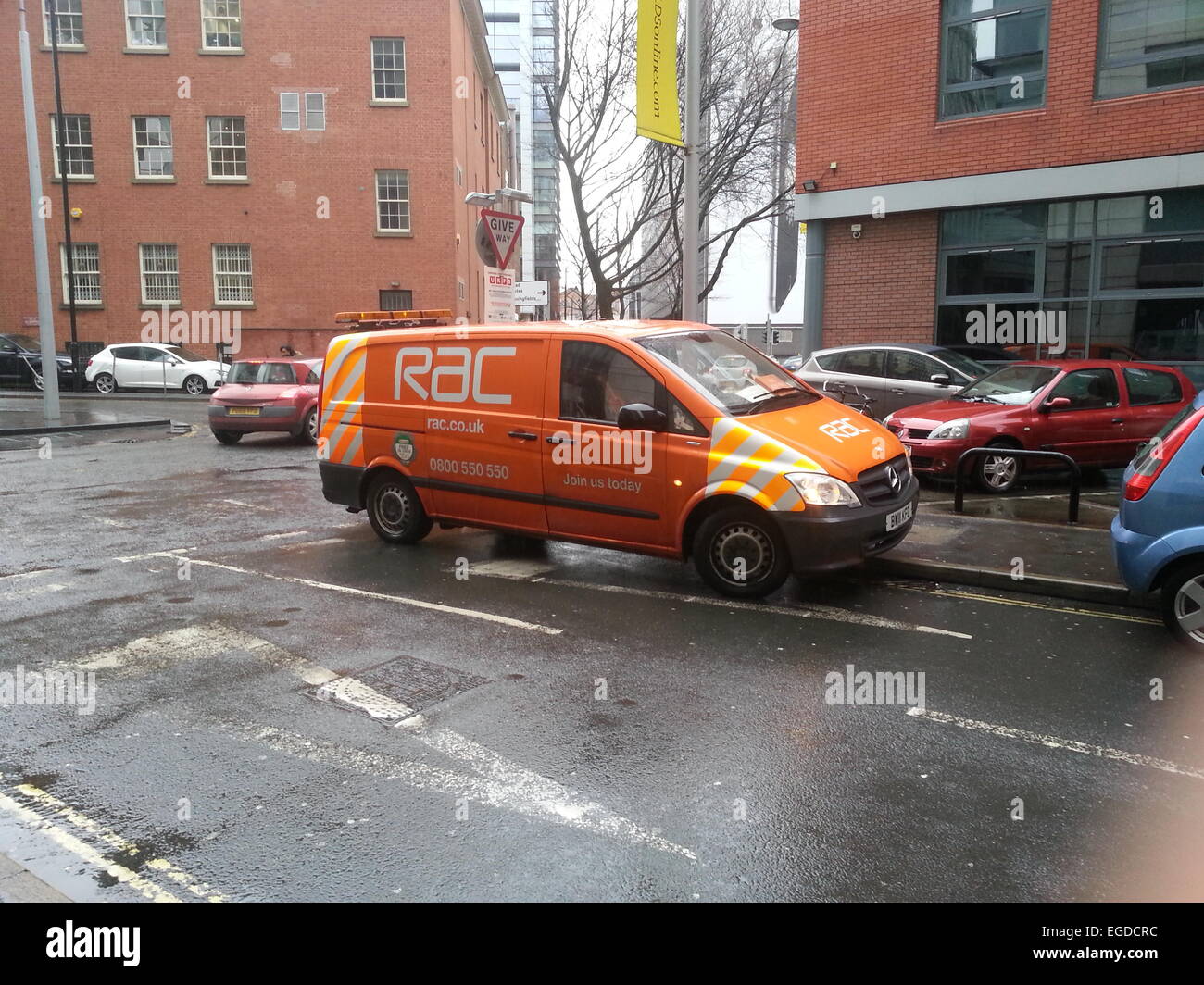 Orange RAC break down van in Spinningfields, manchester Stock Photo - Alamy