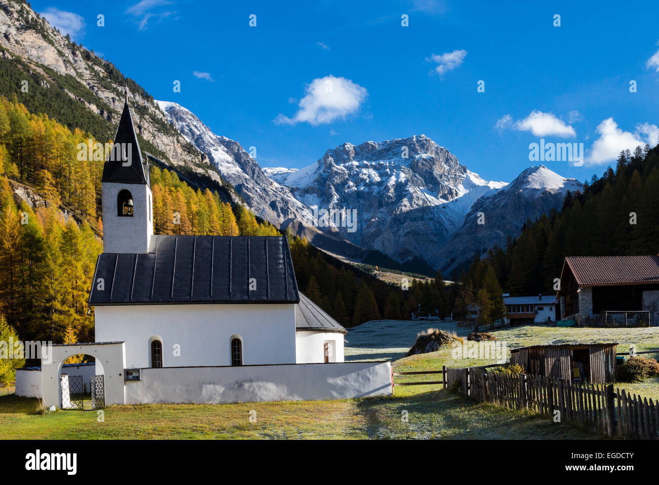 Reformed Church of S-charl in autumn, Scuol, Engadin, Canton of Grisons ...