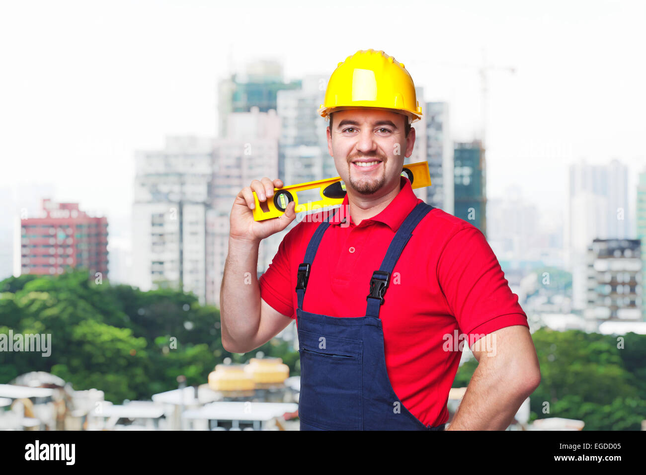 portrait of worker with spirit level Stock Photo - Alamy