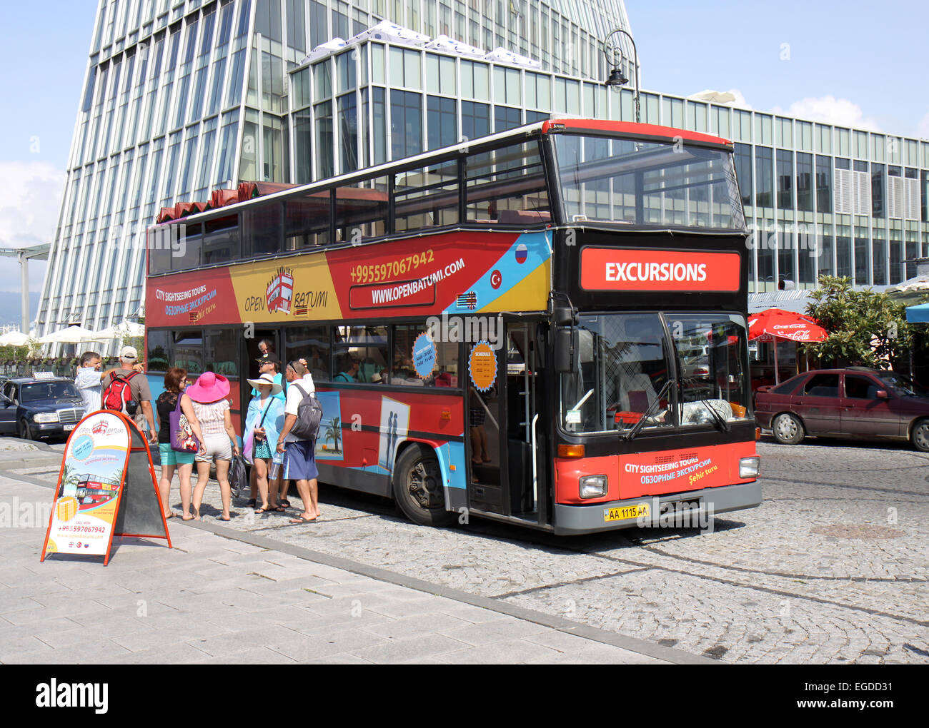 Group of Tourist waiting for Tour Bus in Batumi,Georgia Stock Photo - Alamy