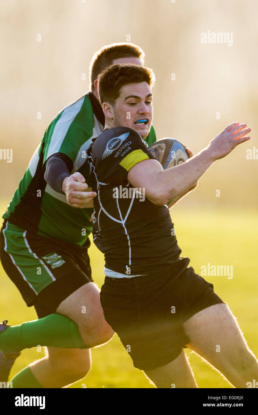 Rugby player running with ball Stock Photo - Alamy