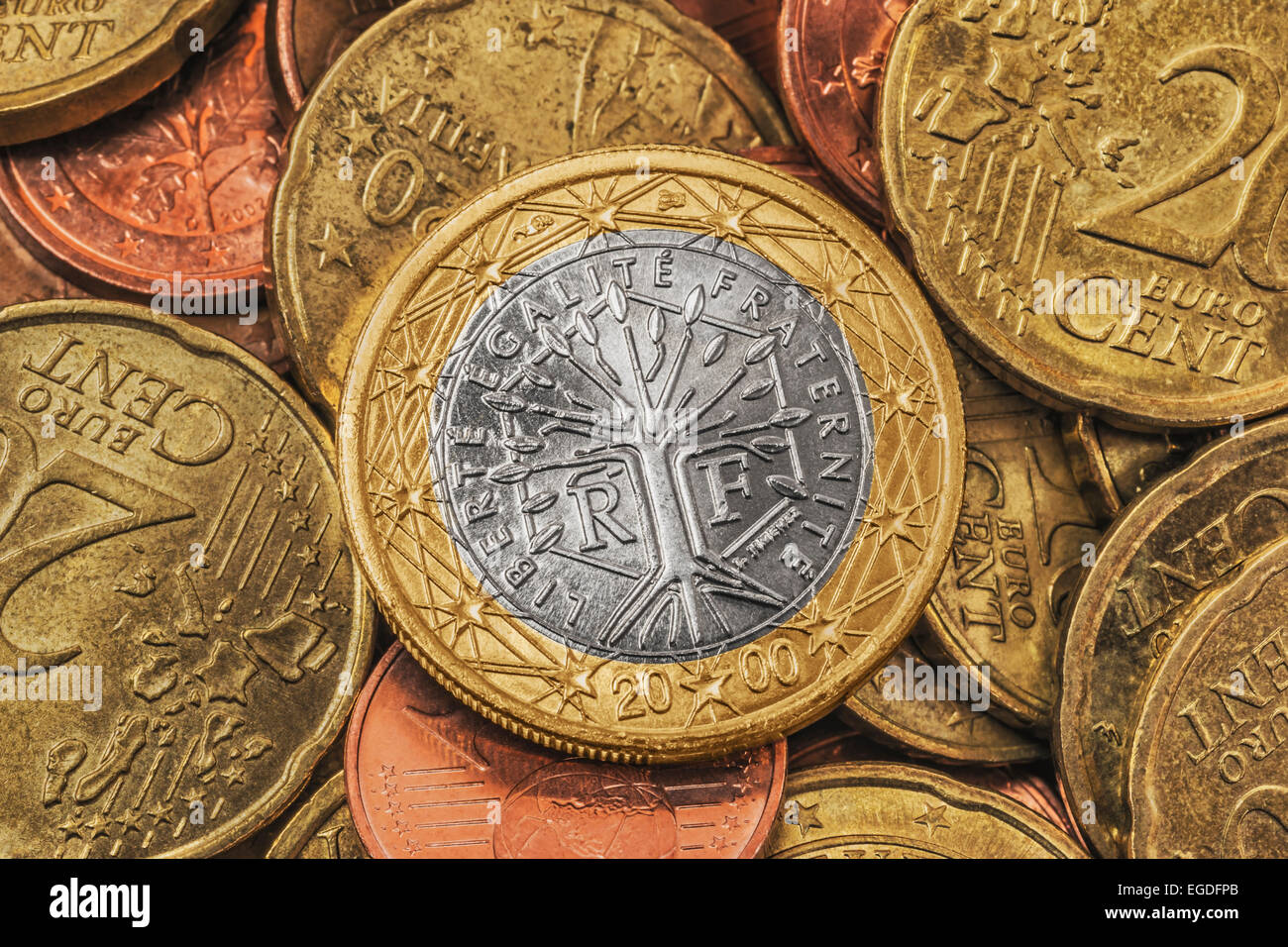 Many Euro coins, on top is a 1 Euro coin from France Stock Photo - Alamy