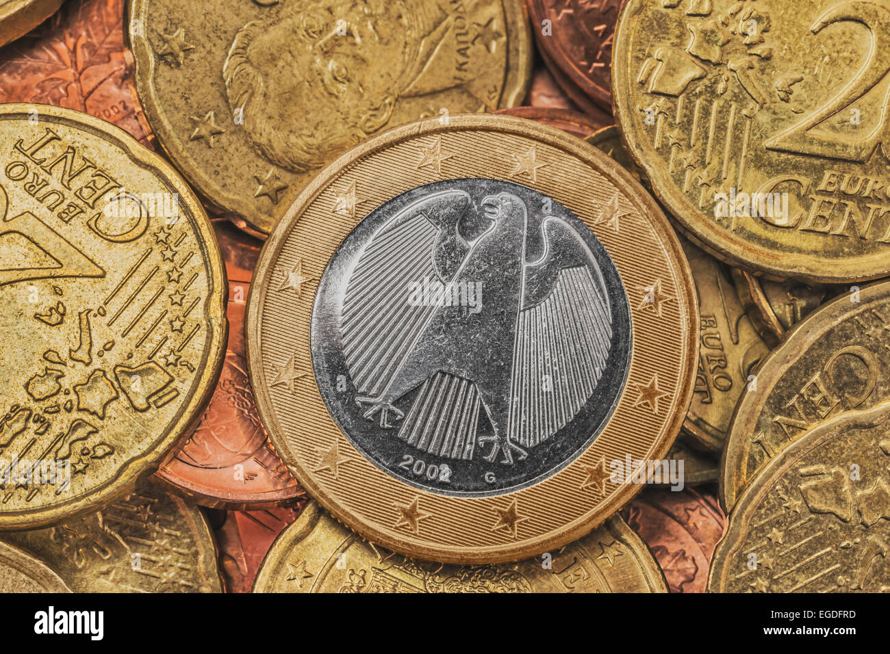 Many Euro coins, on top is a 1 Euro coin from Germany Stock Photo - Alamy