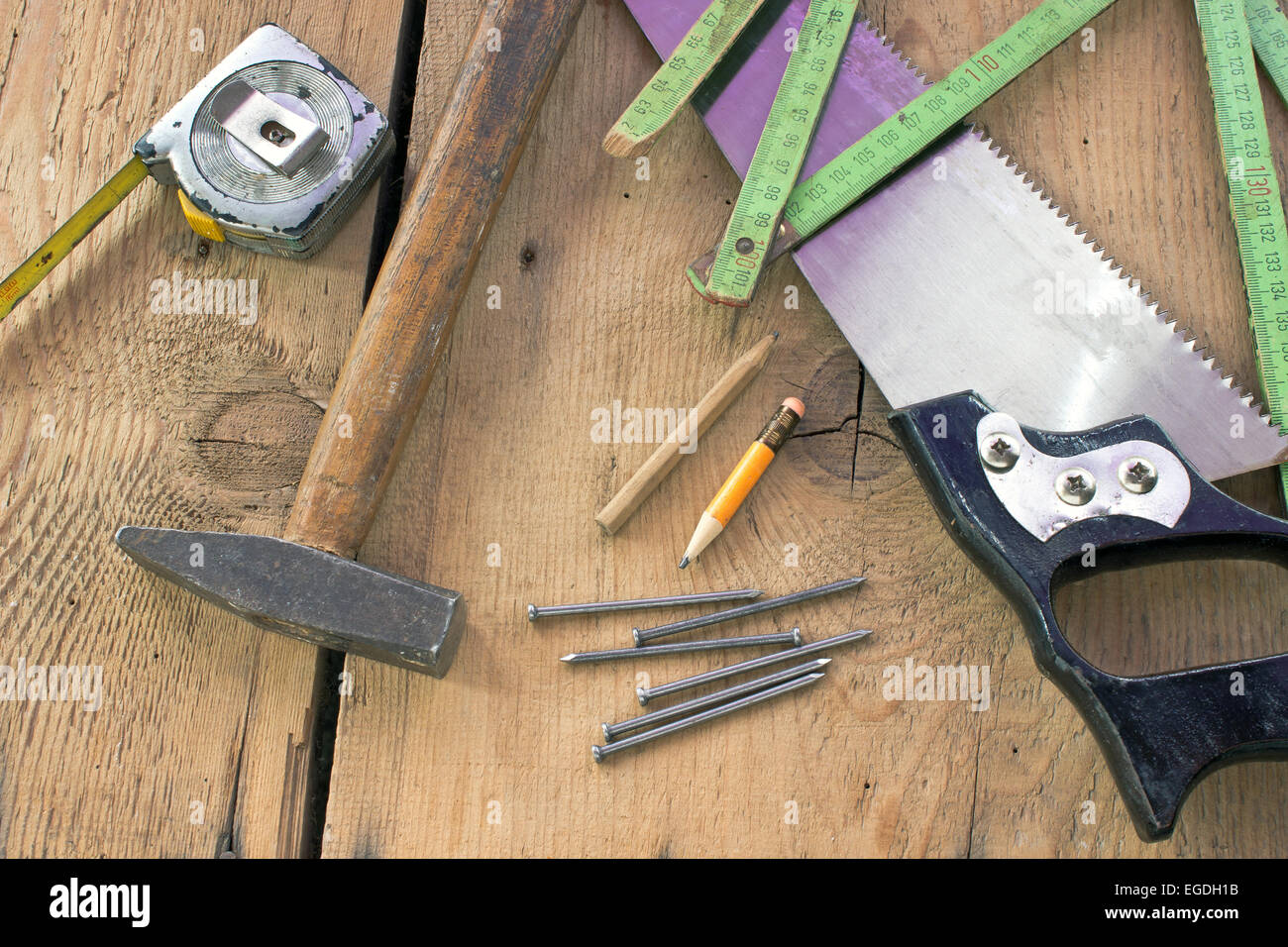 Old used carpentry tools on wooden background Stock Photo - Alamy
