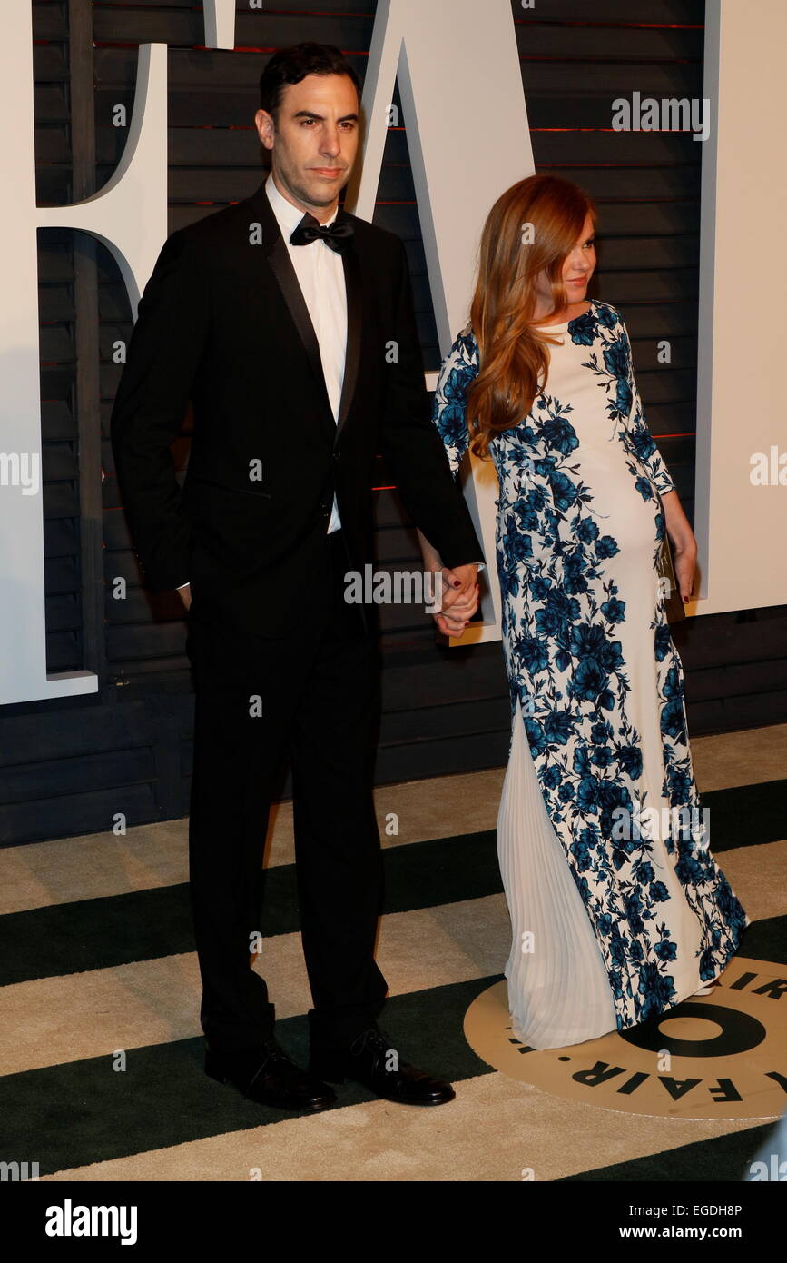 Actors Sacha Baron Cohen and Isla Fisher attend the Vanity Fair Oscar ...