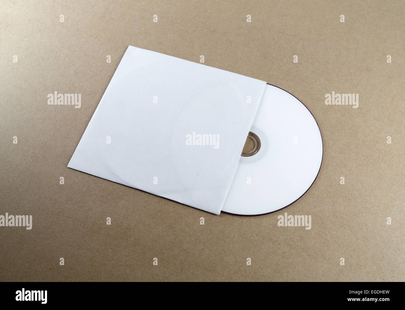 Blank compact disk on a table. Template for branding identity for ...