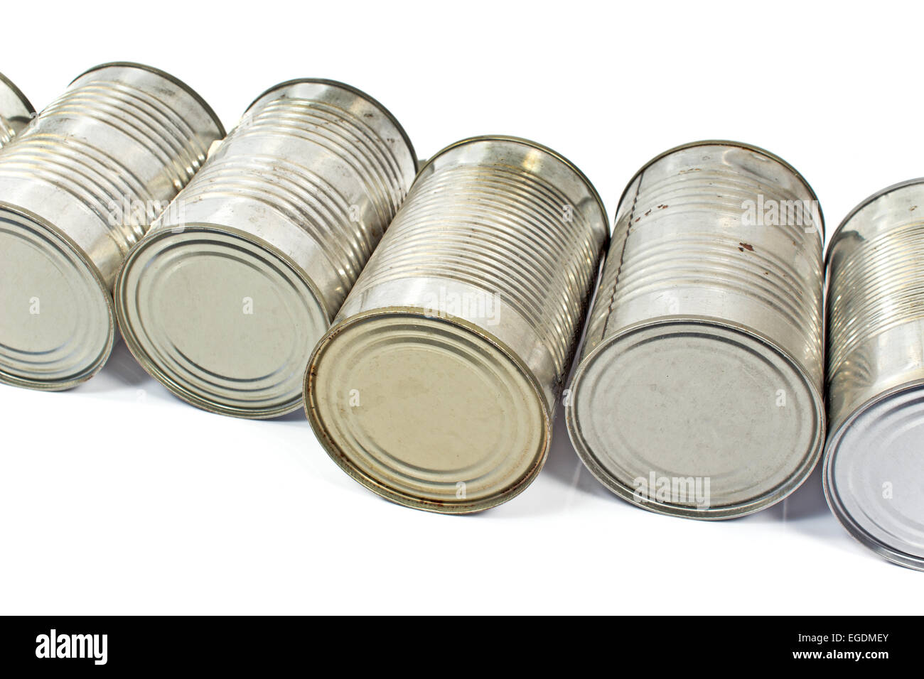 Pile of used cans over white background Stock Photo - Alamy