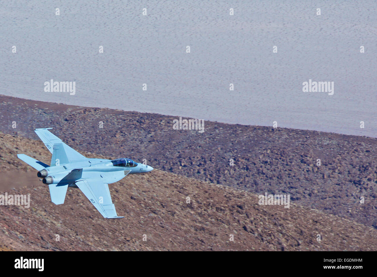 Topside View Of A US Navy F/A-18E Super Hornet Jet Fighter, Flying At ...