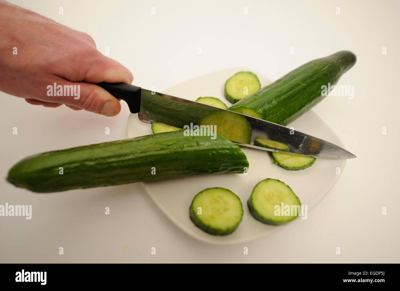 Cucumber chopping hi-res stock photography and images - Alamy
