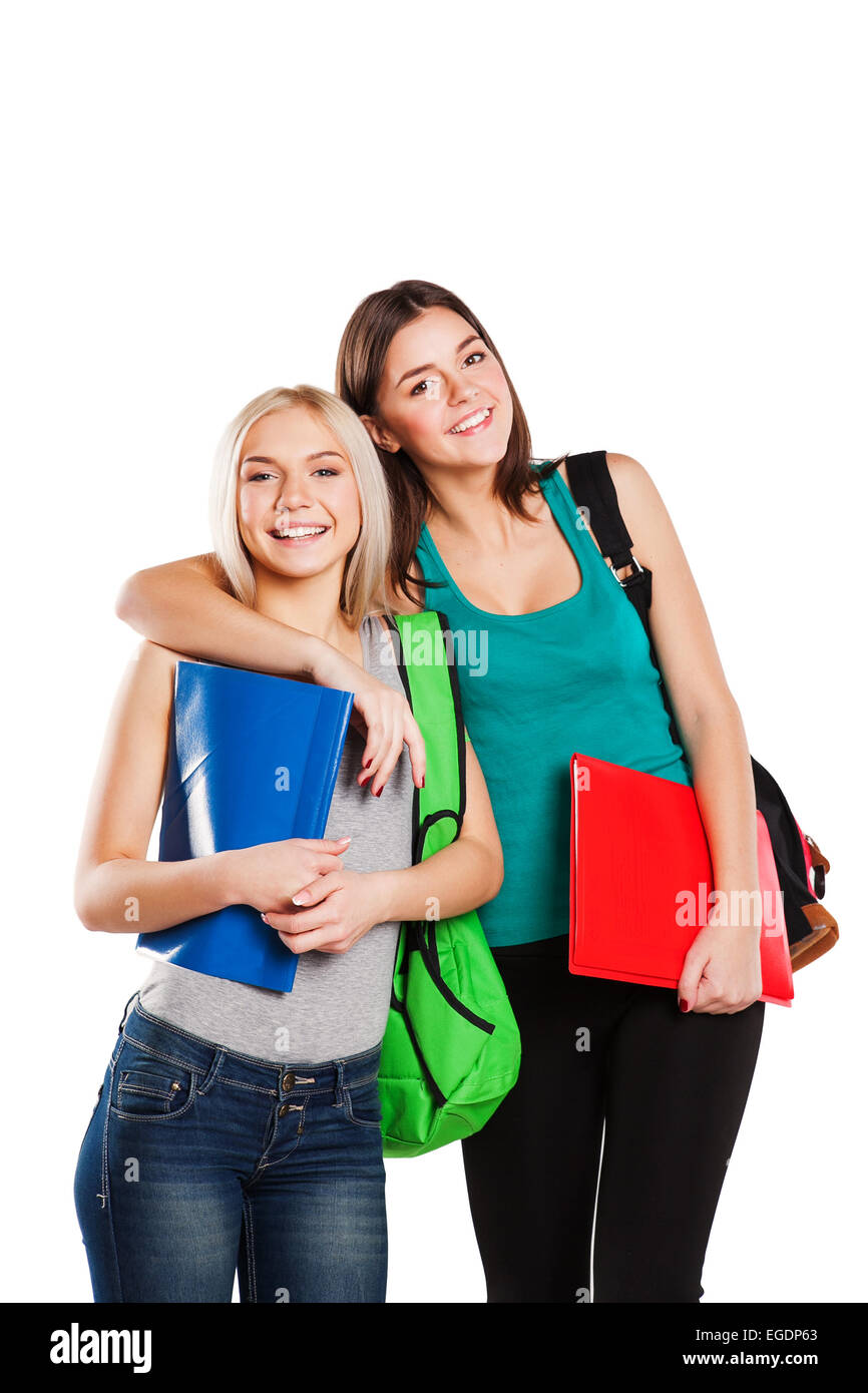 Two happy young happy students over white background Stock Photo - Alamy