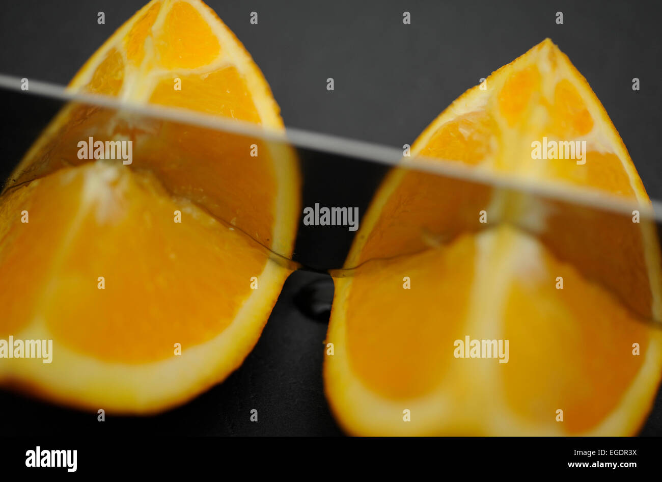 Quarter orange hi-res stock photography and images - Alamy