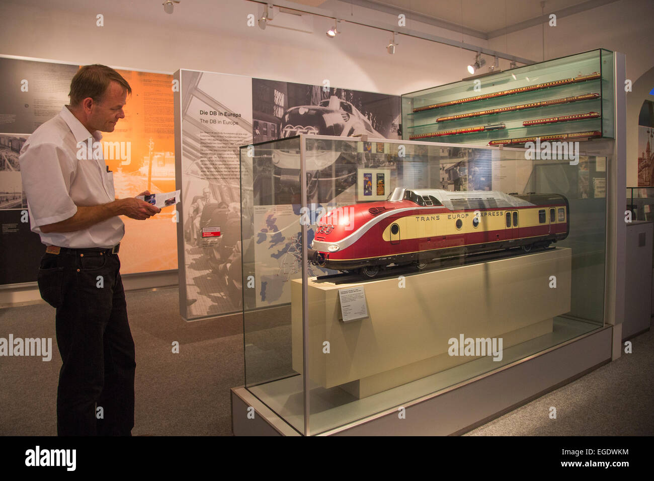 Man admiring a model of the TEE Trans Europe Express train in the ...