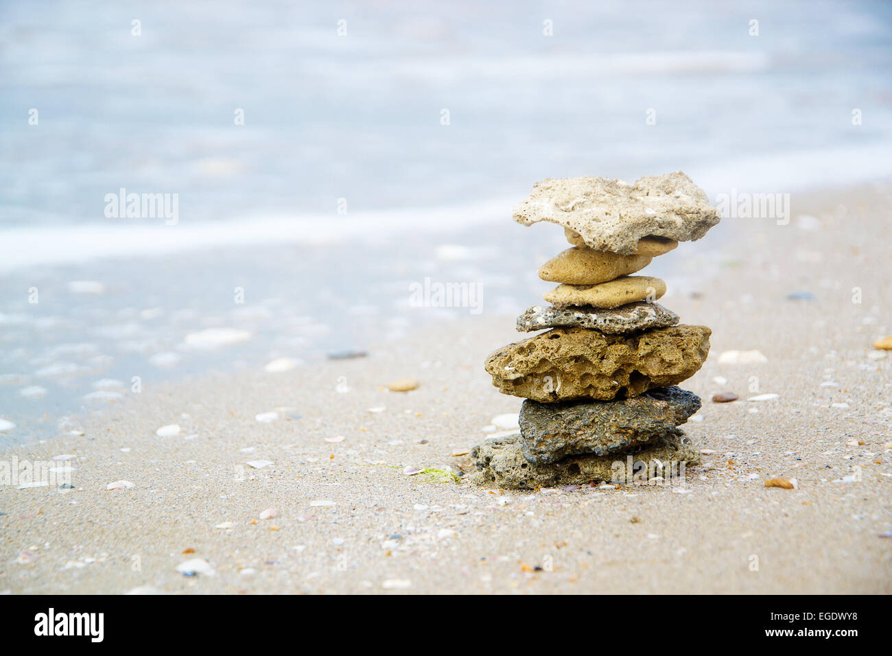 Pebble stack on the seashore Stock Photo - Alamy