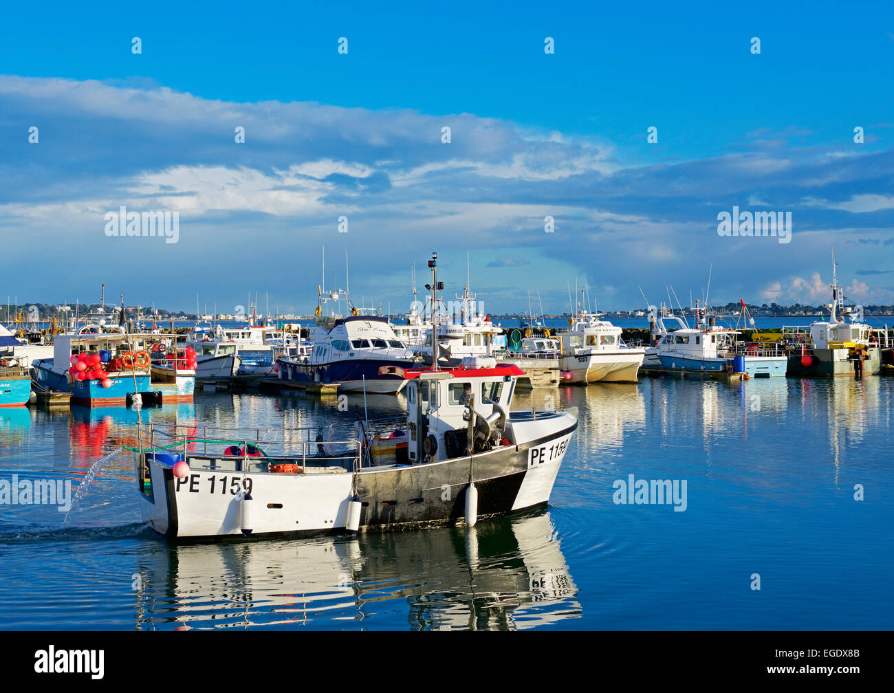 Fishing boats in the harbour, Poole, Dorset, England UK Stock Photo - Alamy