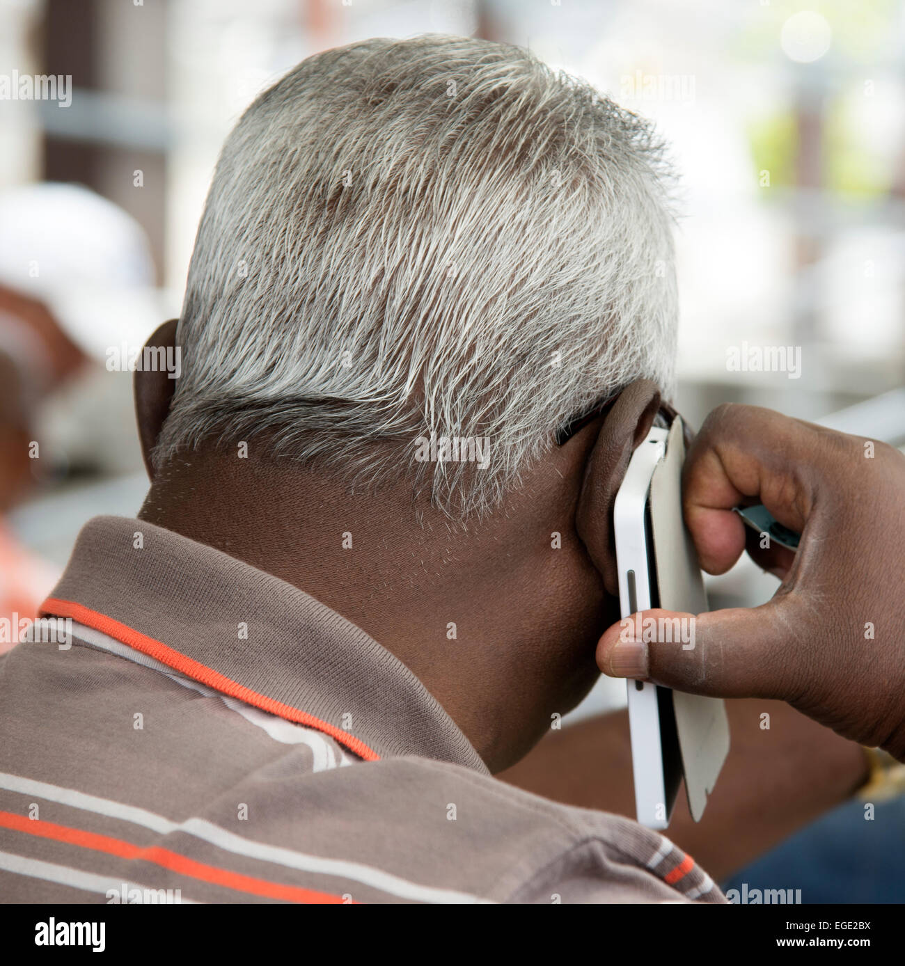 Man mobile rear view hi-res stock photography and images - Alamy