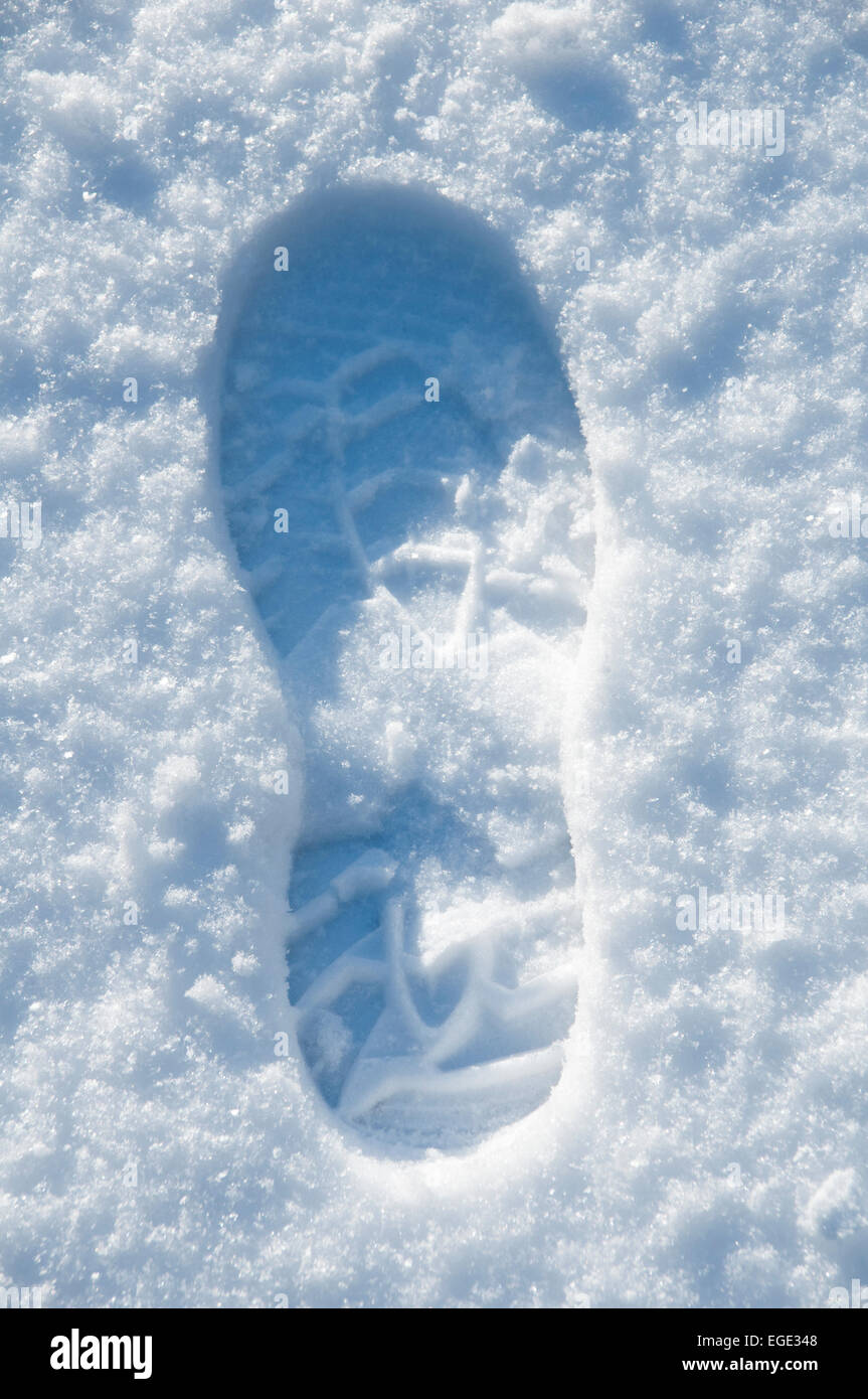 Footprint in Fresh Snow Stock Photo - Alamy