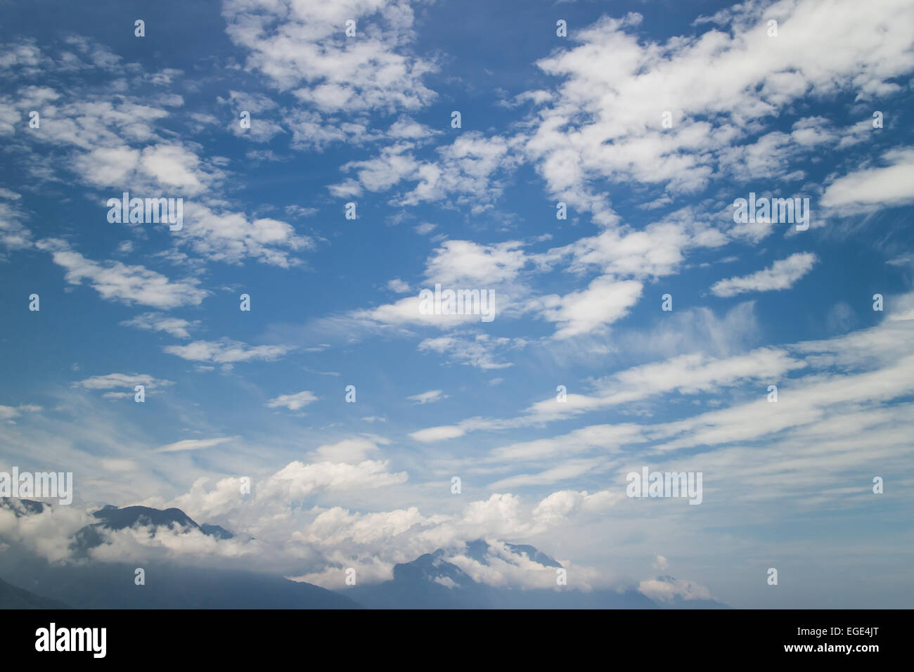 Cloudy blue sky clouds hi-res stock photography and images - Alamy