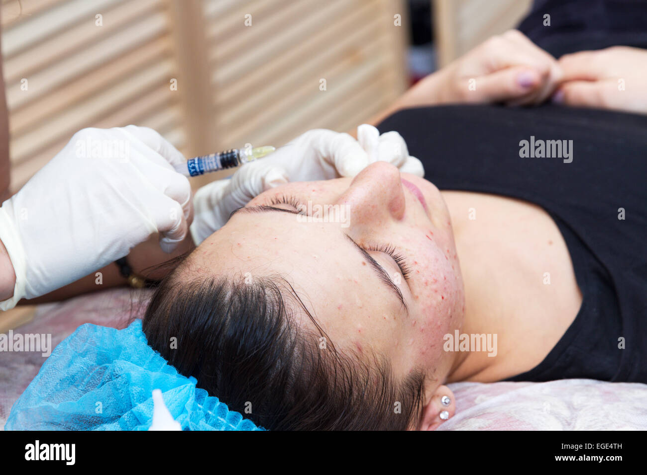 Injections on the face with cosmetic procedures , woman having beauty ...