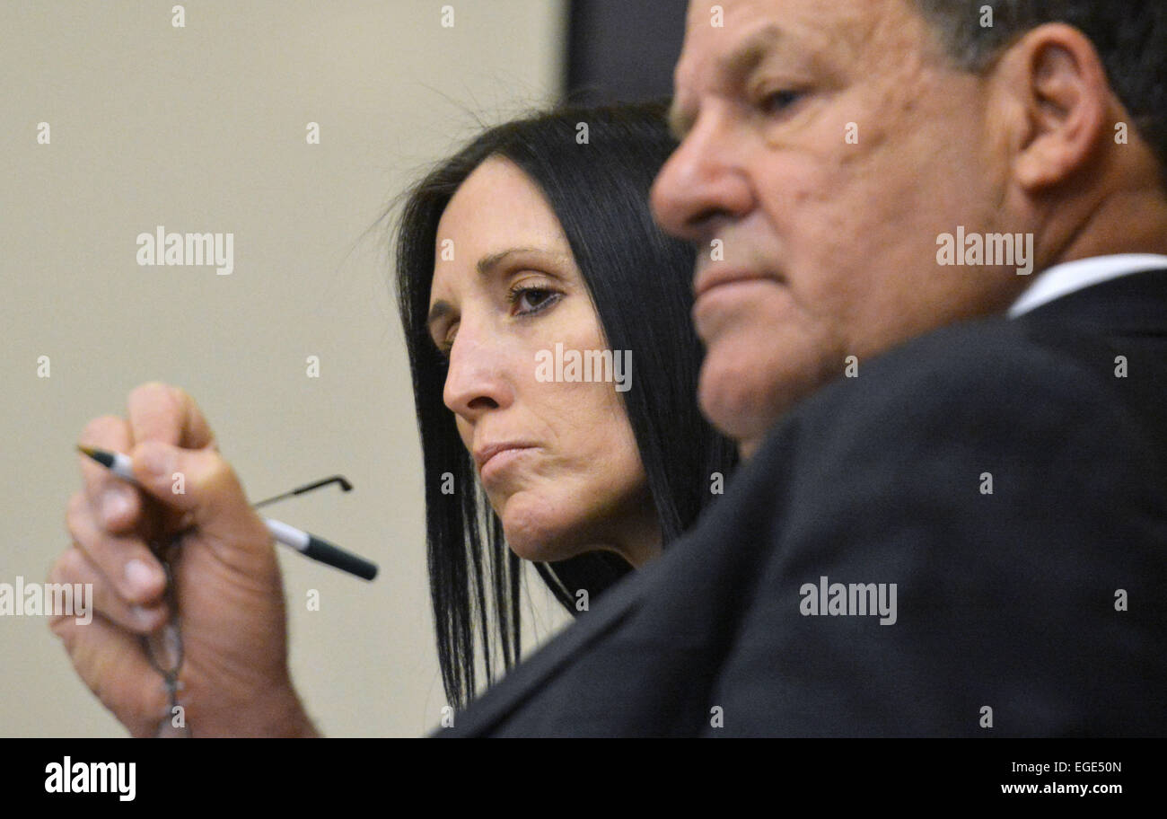 Usa. 23rd Feb, 2015. ASEC -- Janet Neal with her lawyer Michael Danoff ...