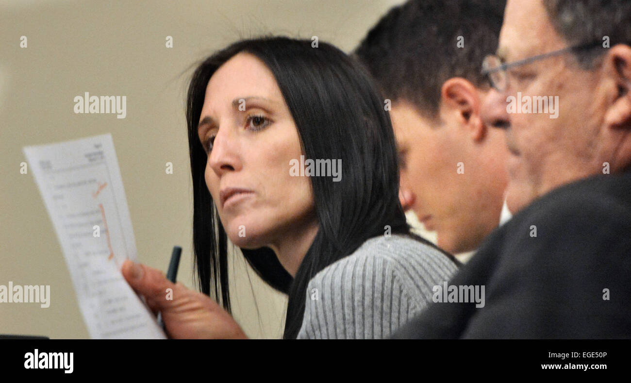 Usa. 23rd Feb, 2015. ASEC -- Janet Neal with her lawyers at her civil ...