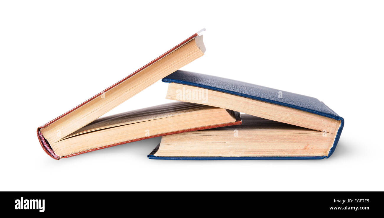 Two old books imbedded in one another isolated on white background ...