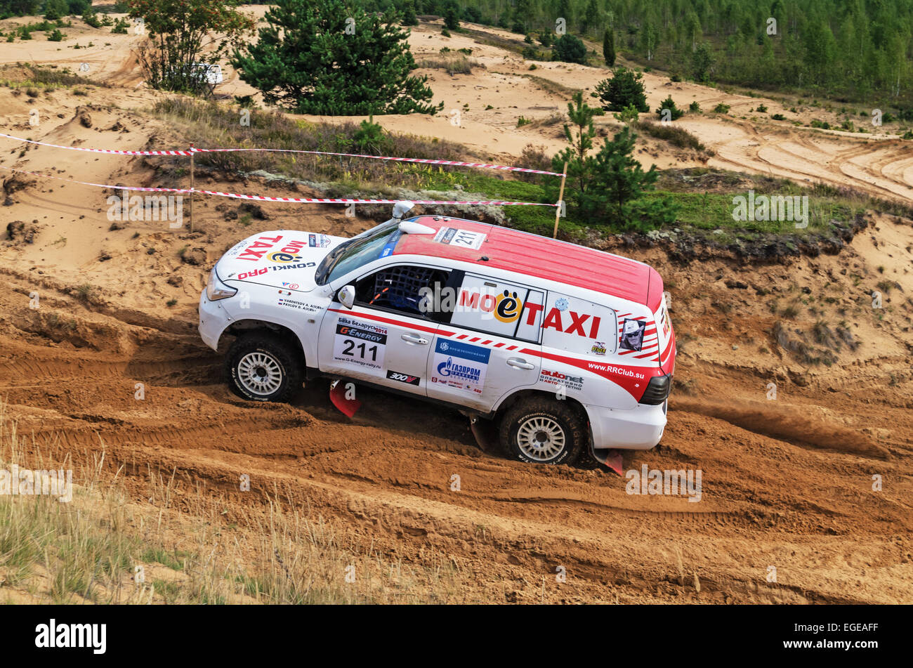 Races on a rally-raid on sandy dunes. Rally-raid Baha "Belarus" 2014 ...