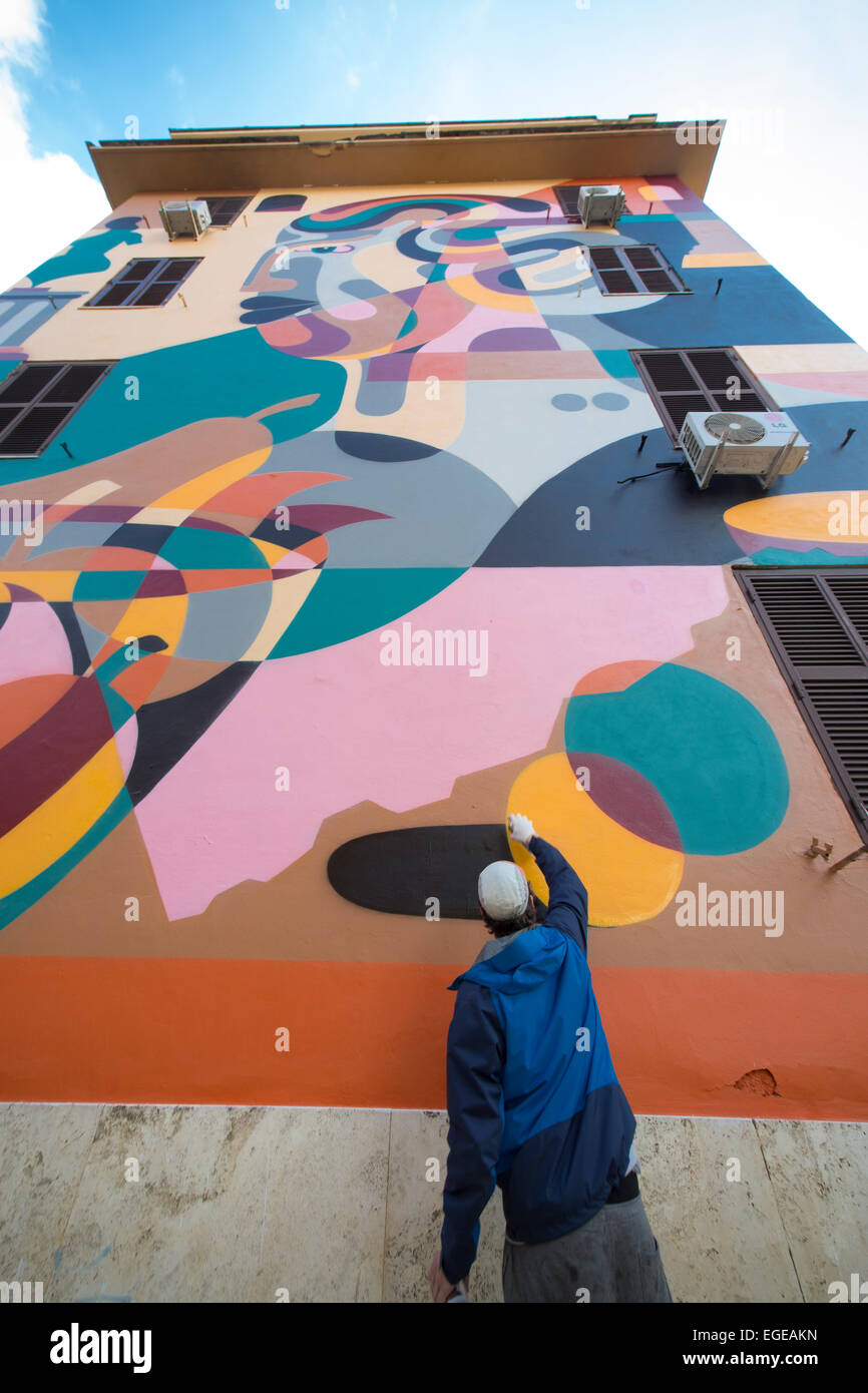 Worldwide famous urban artist Reka (Australia, 36) painting a wall in ...