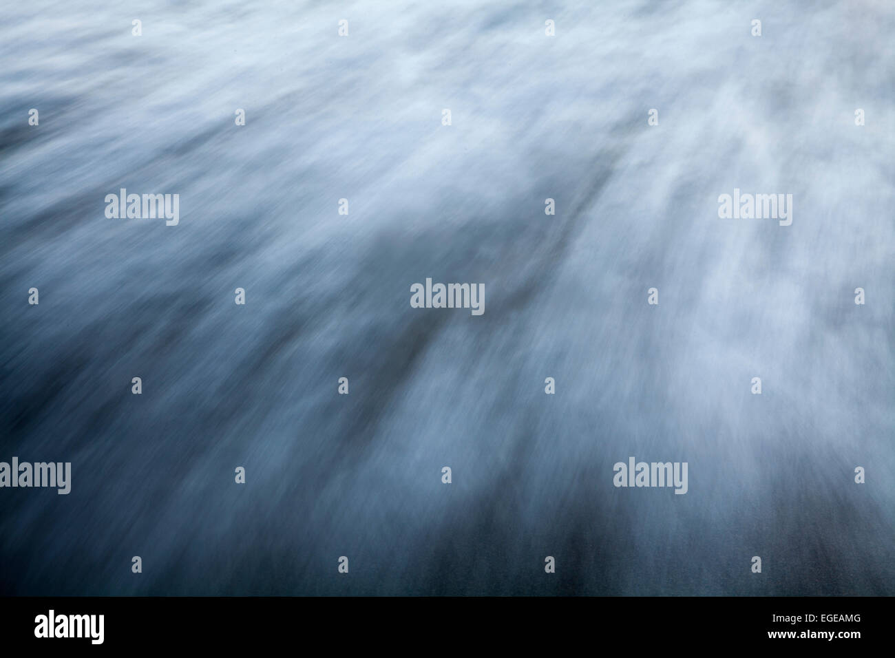 Abstract rushing blue water Stock Photo - Alamy