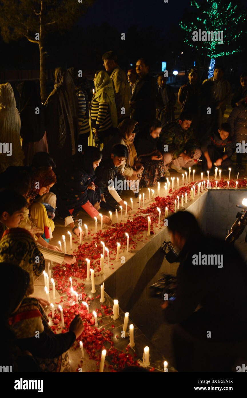 Quetta. 23rd Feb, 2015. People light candles during a vigil ceremony ...