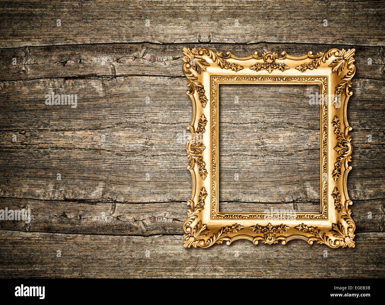 Baroque golden frame over rustic wooden background. Grungy texture ...