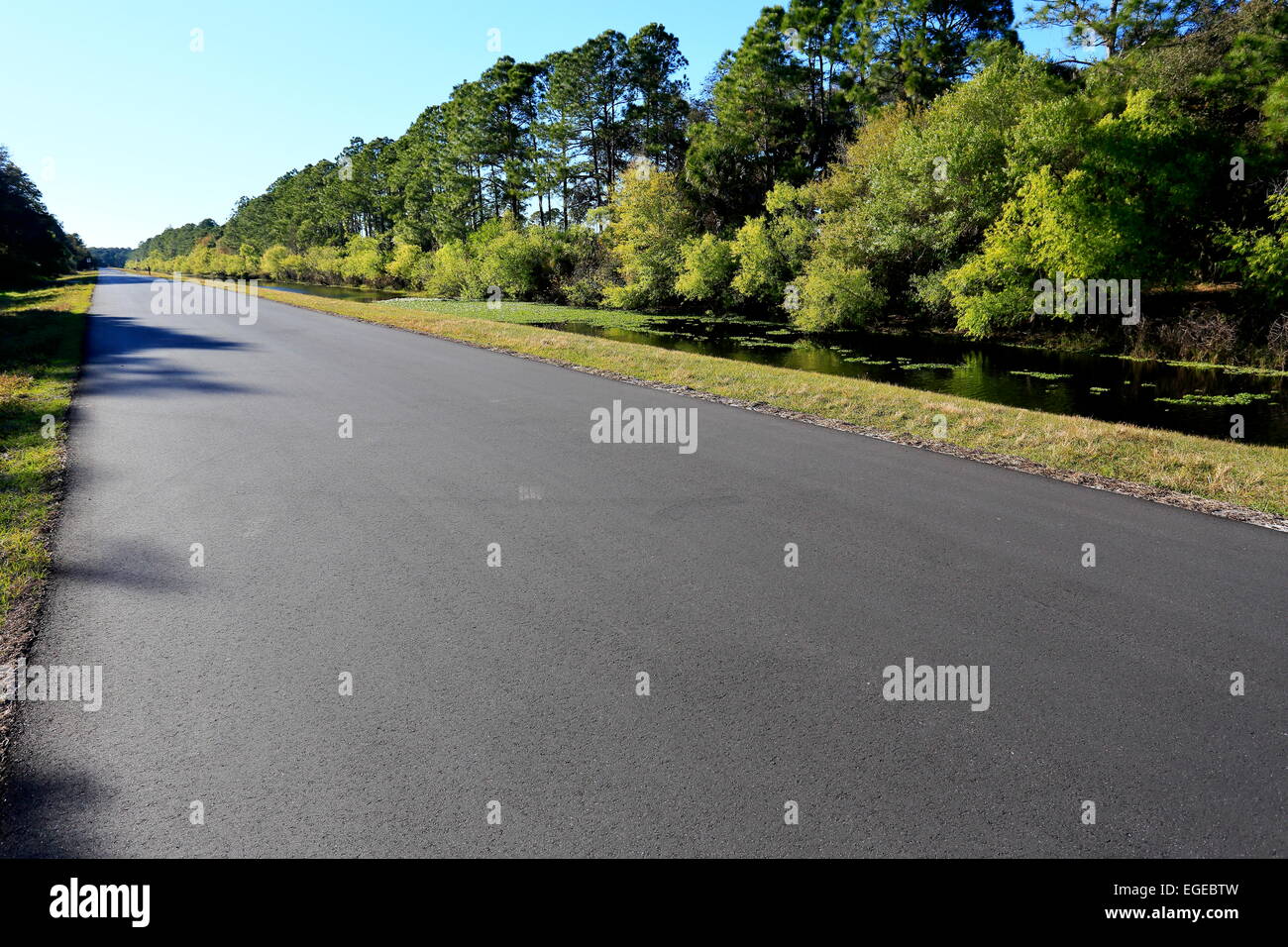 A paved road or highway background for use in pasting in vehicles ...