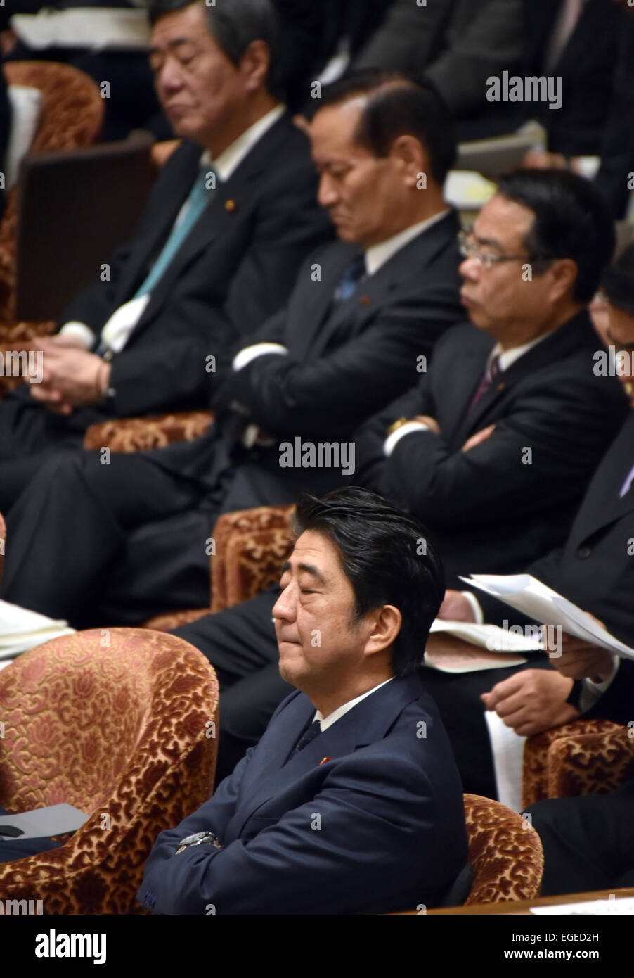 Tokyo, Japan. 23rd Feb, 2015. Japan's Prime Minister Shinzo Abe, seated ...