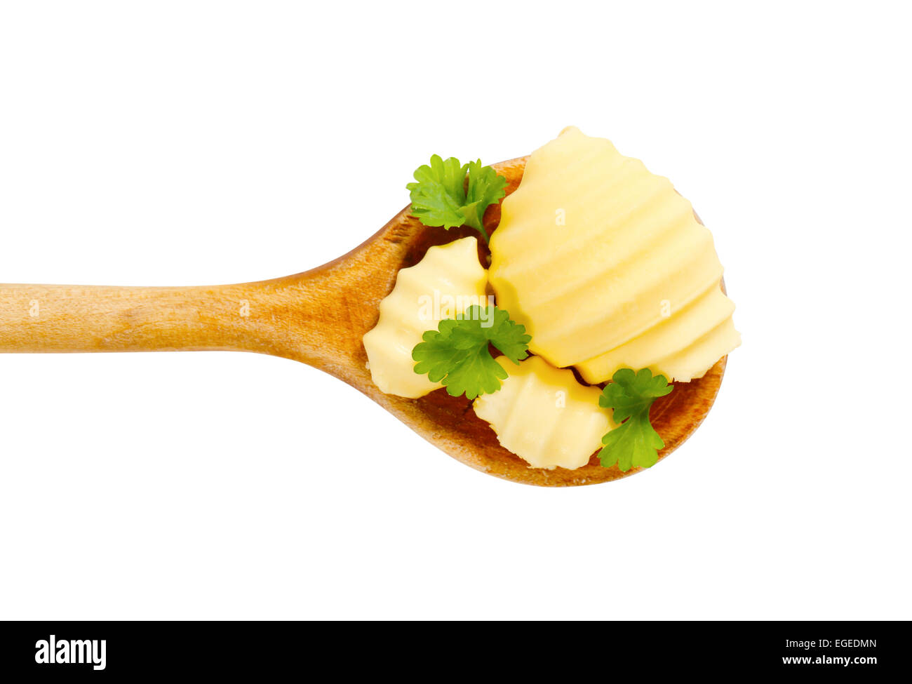 Butter curls on wooden spoon Stock Photo - Alamy