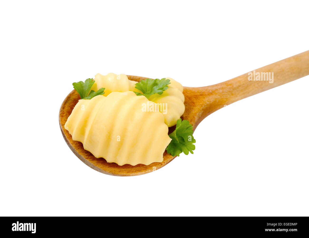 Butter curls on wooden spoon Stock Photo - Alamy