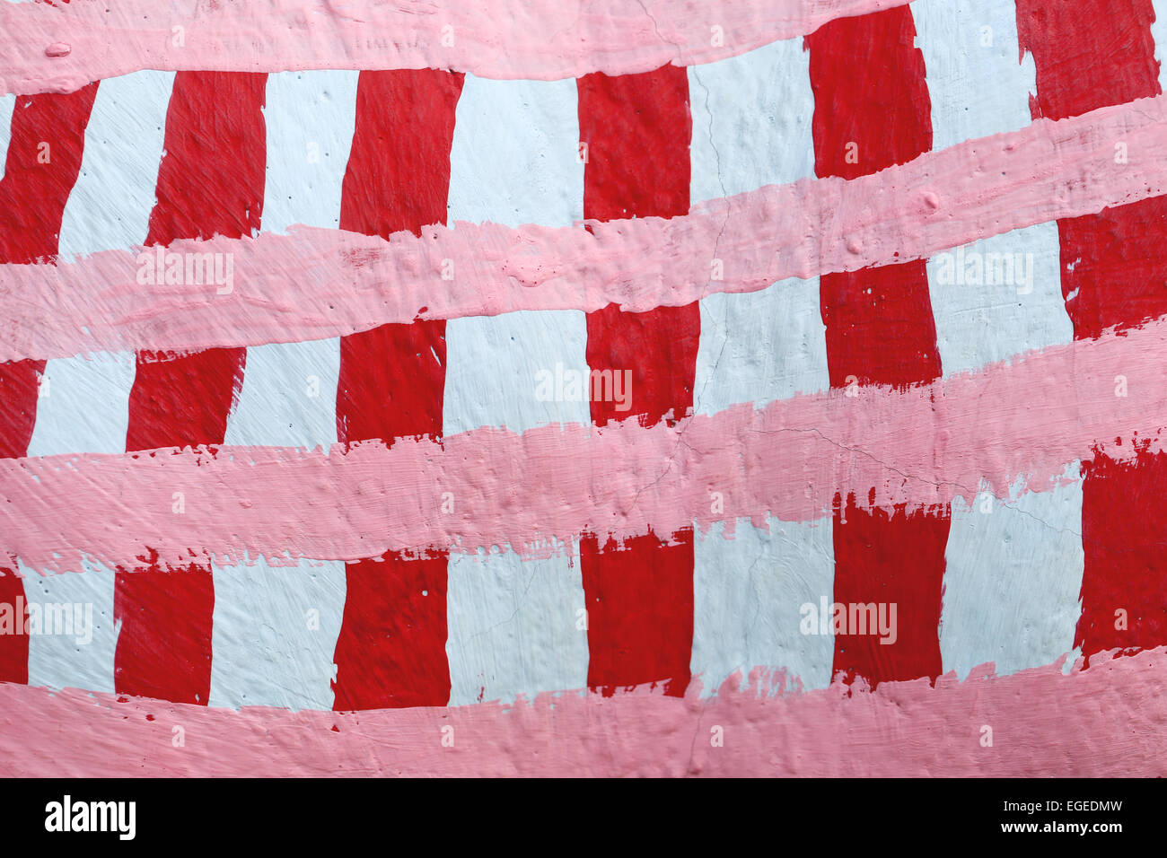 Red and white square pattern on a stone wall Stock Photo - Alamy