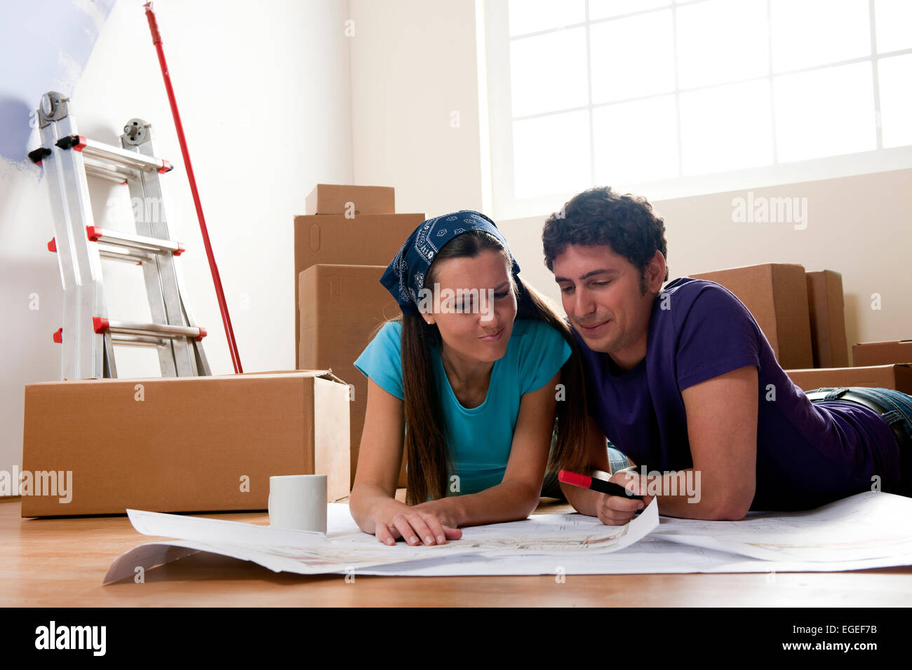 Couple making plans for new home hi-res stock photography and images ...