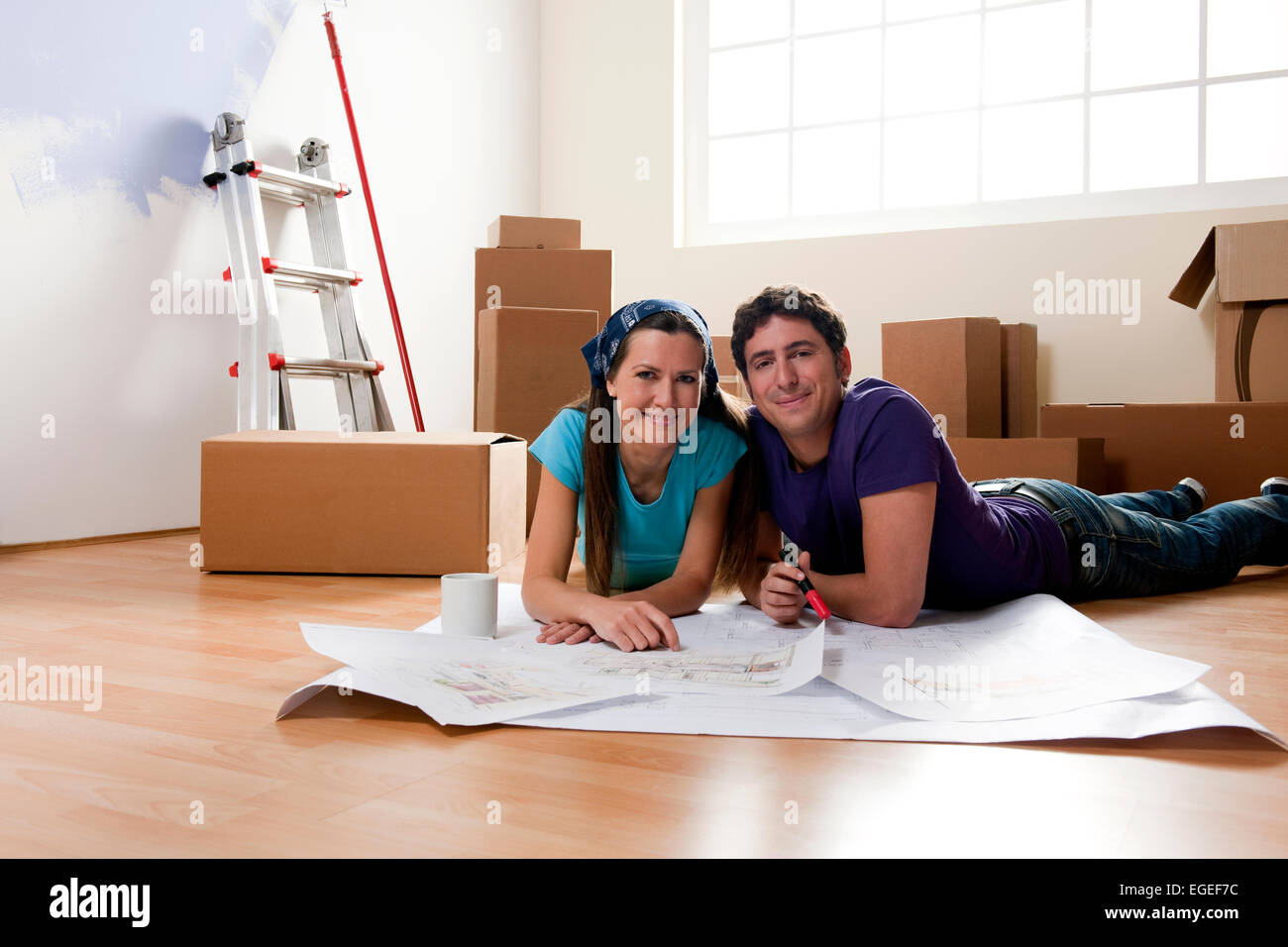 Couple making plans for new home hi-res stock photography and images ...