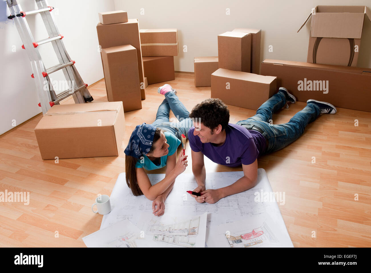 Couple making plans for new home hi-res stock photography and images ...