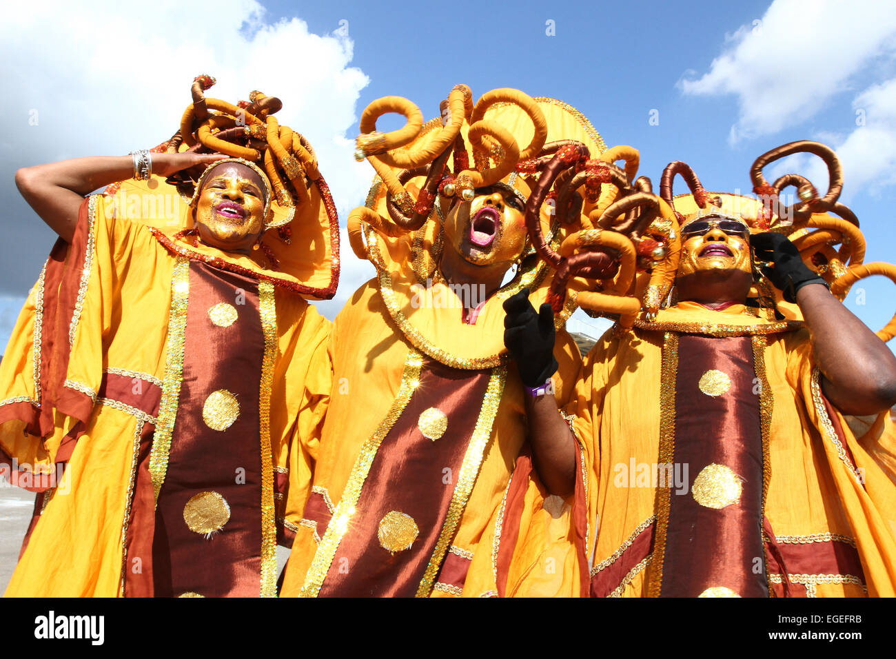 Masqueraders from the 'Dis Living Maskerade' perform in the Queen's ...