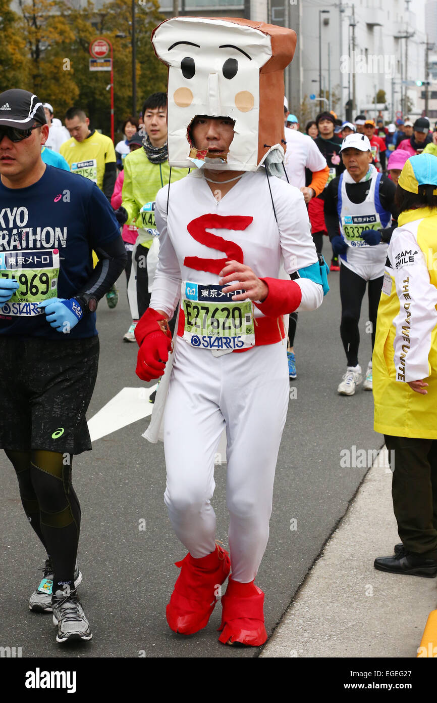 A runner wearing fancy dress competes in Tokyo Marathon 2015 on ...