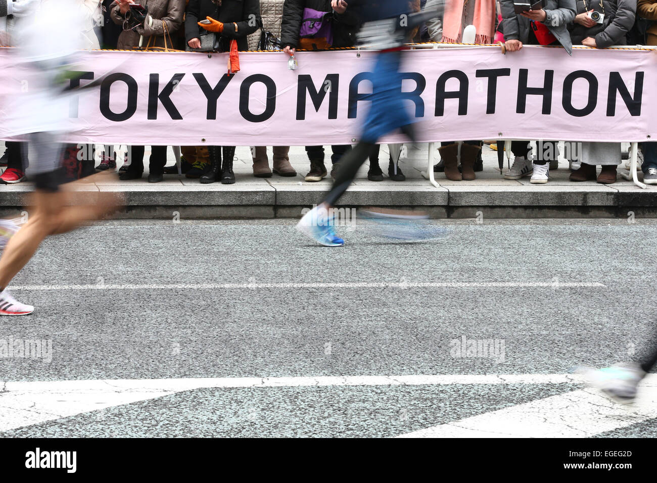 Runners pass through the Ginza District in Tokyo Marathon 2015 on ...