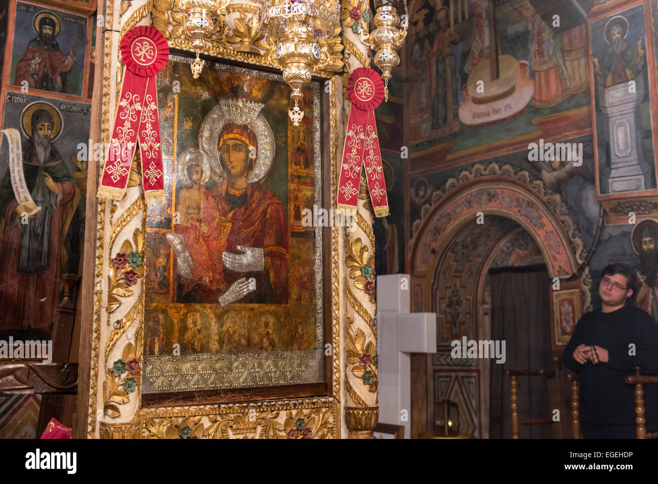 Man Praying The Holy Virgin, Troyan Monastery Stock Photo - Alamy