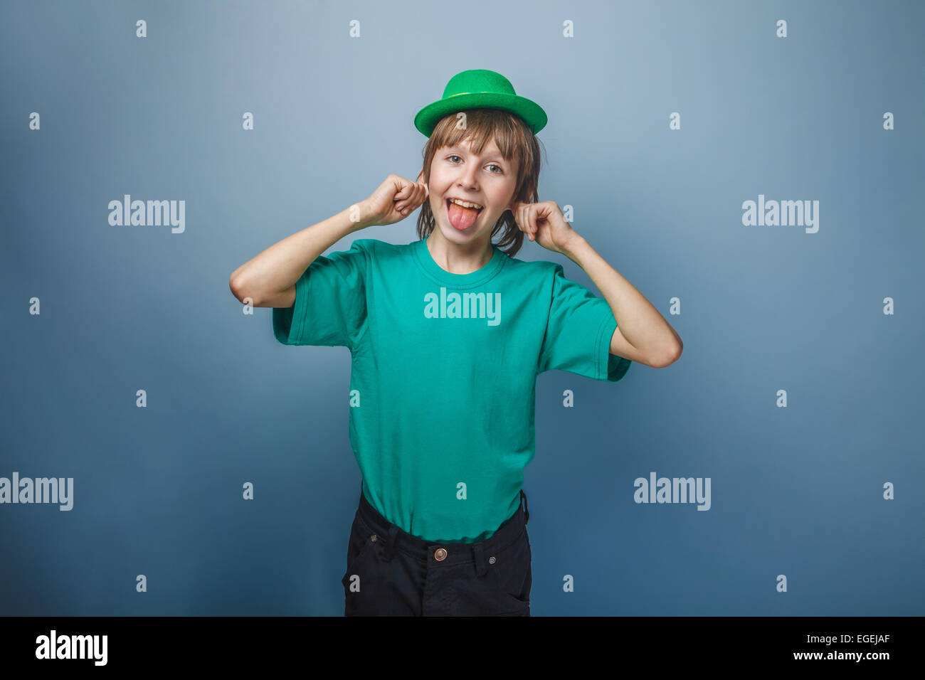 European-looking boy of ten years smiley shows the language in a Stock ...