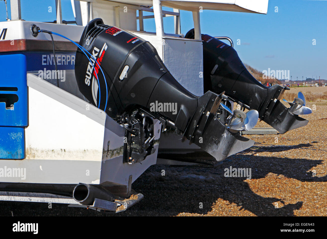 Twin outboard motors on an inshore fishing catamaran at Aldeburgh ...